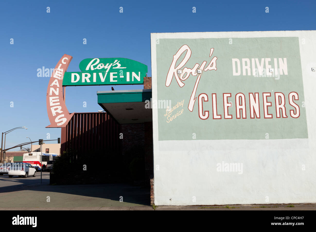 A drive-in cleaners sign Stock Photo - Alamy