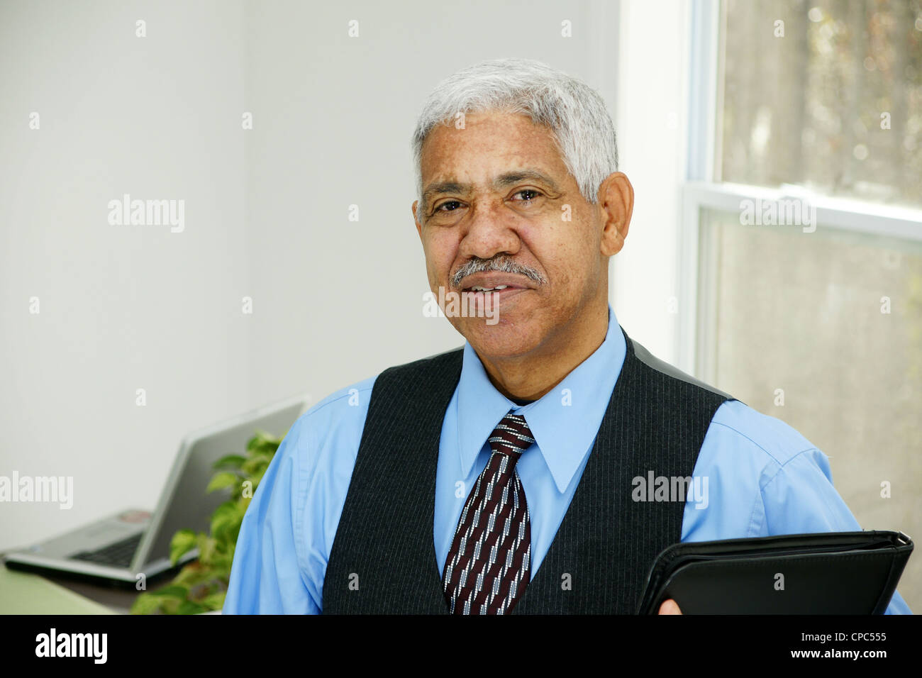 Senior man ready for the work day Stock Photo - Alamy