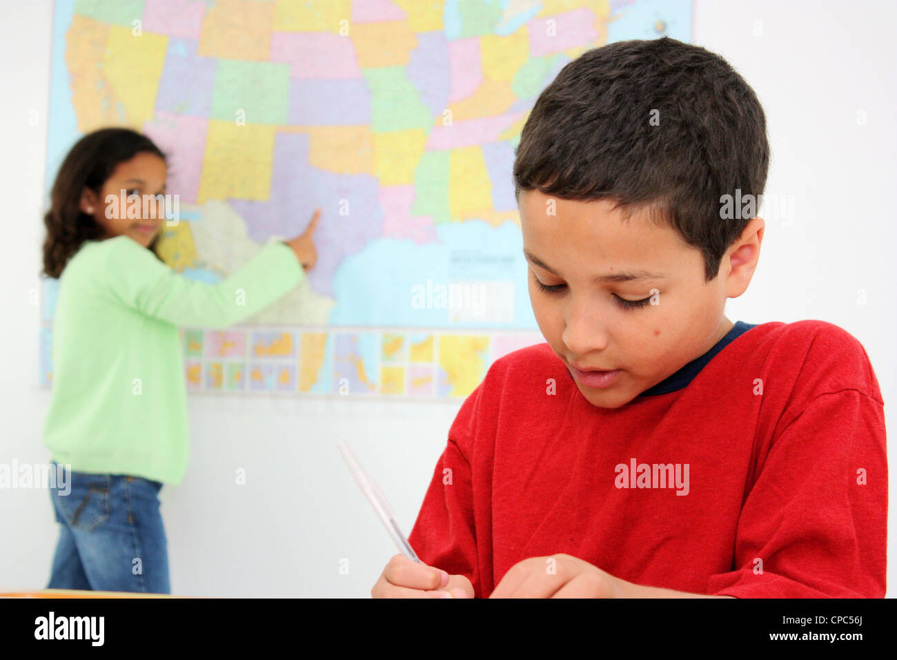 Students in a classroom at elementary school Stock Photo - Alamy