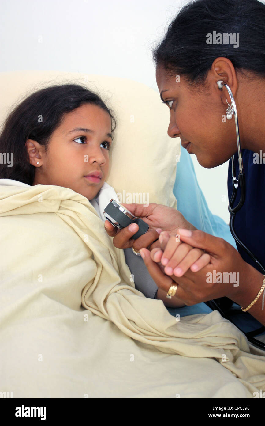 Child laying sick in bed at the hospital Stock Photo - Alamy