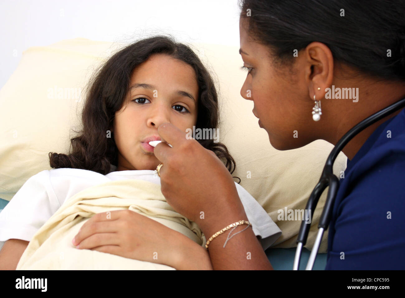 Child laying sick in bed at the hospital Stock Photo - Alamy
