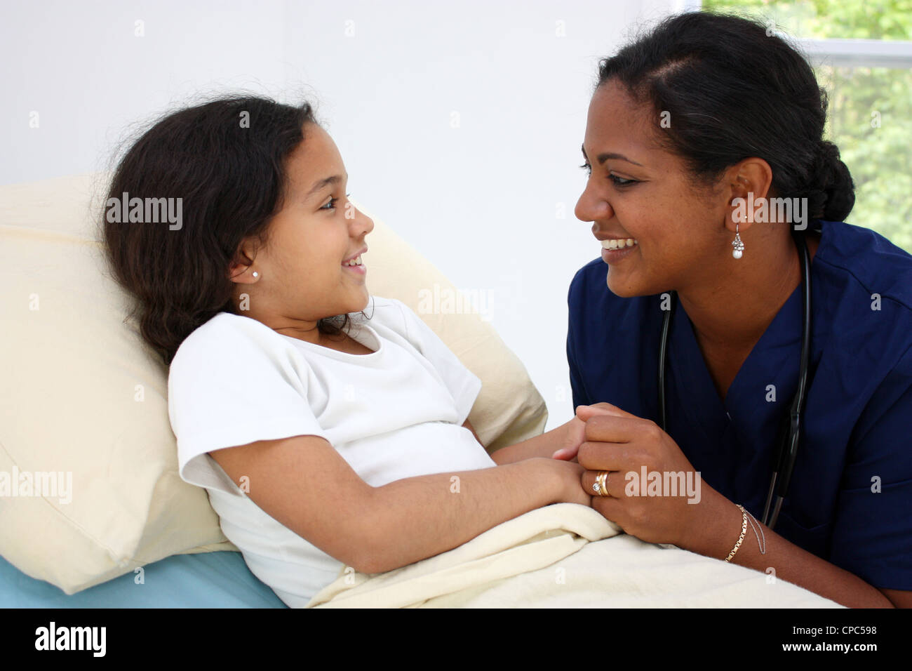 Child laying sick in bed at the hospital Stock Photo - Alamy