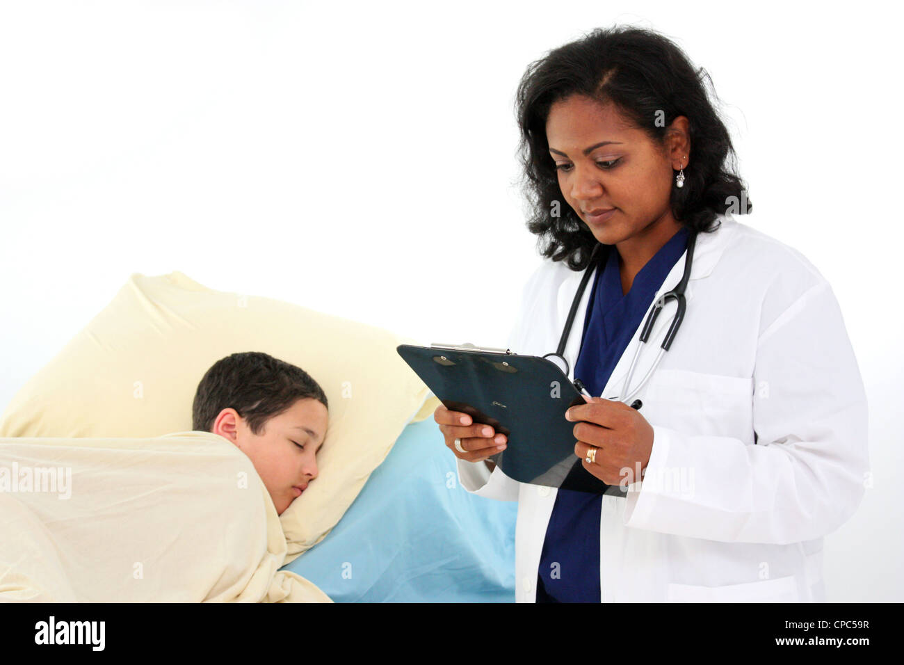 Child laying sick in bed at the hospital with doctor Stock Photo - Alamy