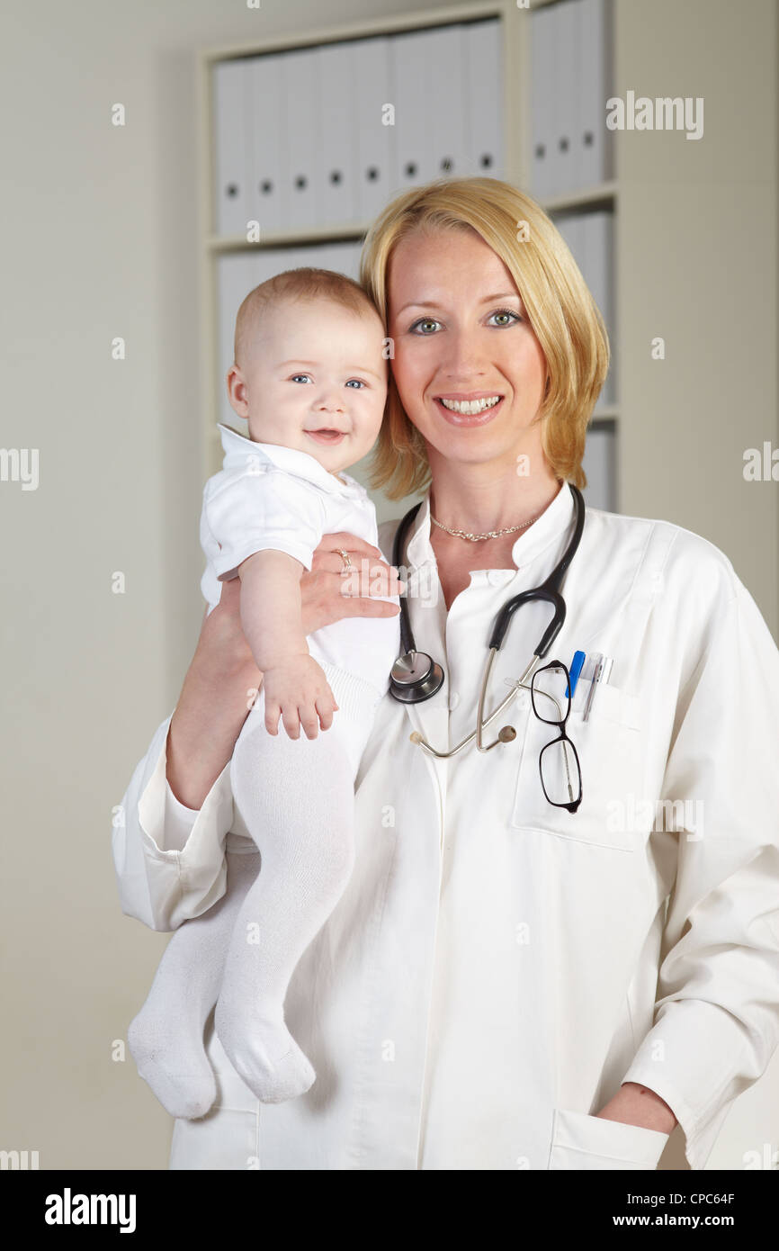 doctor with baby Stock Photo - Alamy