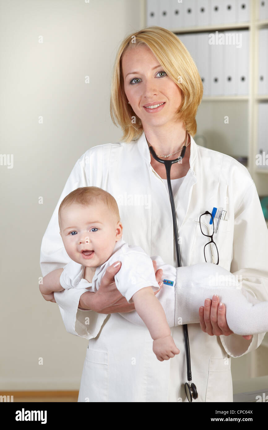 doctor with baby Stock Photo - Alamy