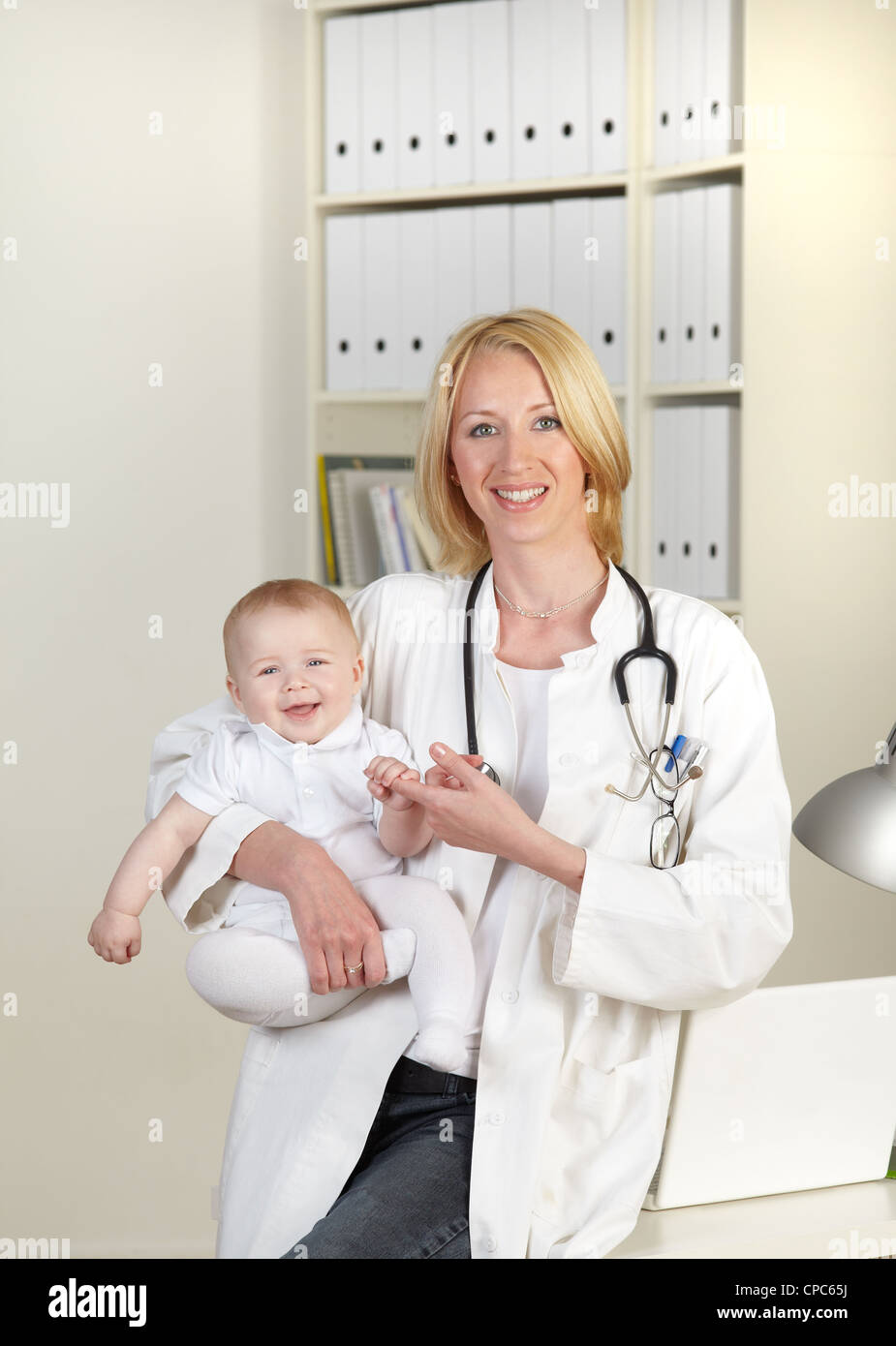 doctor with baby Stock Photo - Alamy