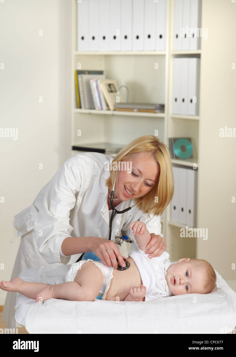 doctor with baby Stock Photo - Alamy