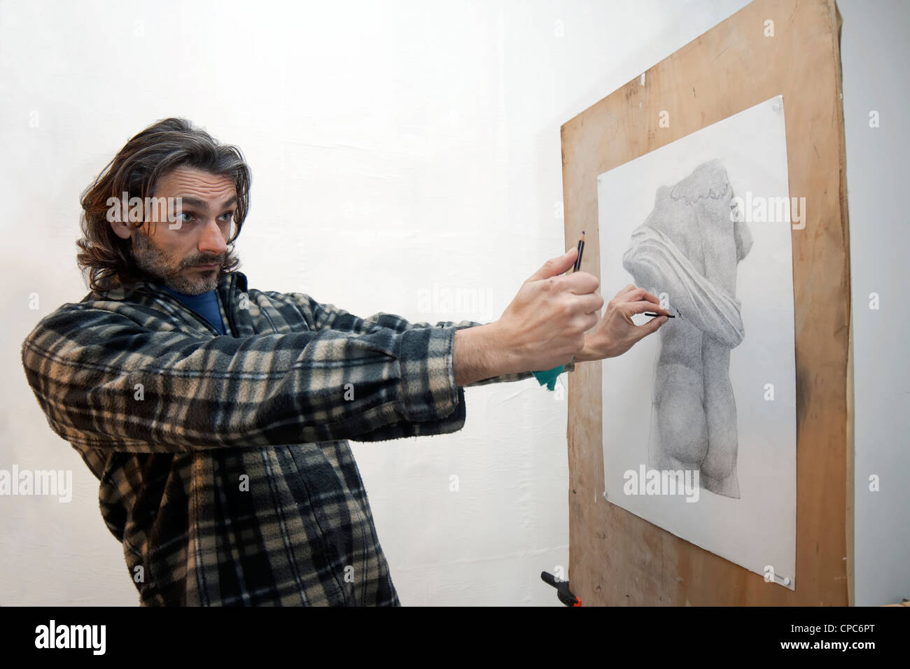 artist drawing a copy of an antique statue Stock Photo - Alamy