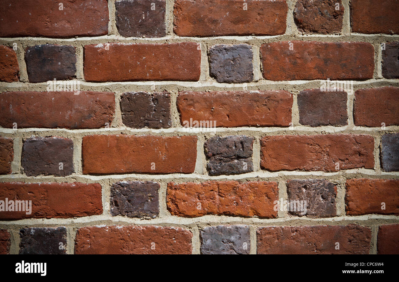 Dark red brick wall Stock Photo - Alamy