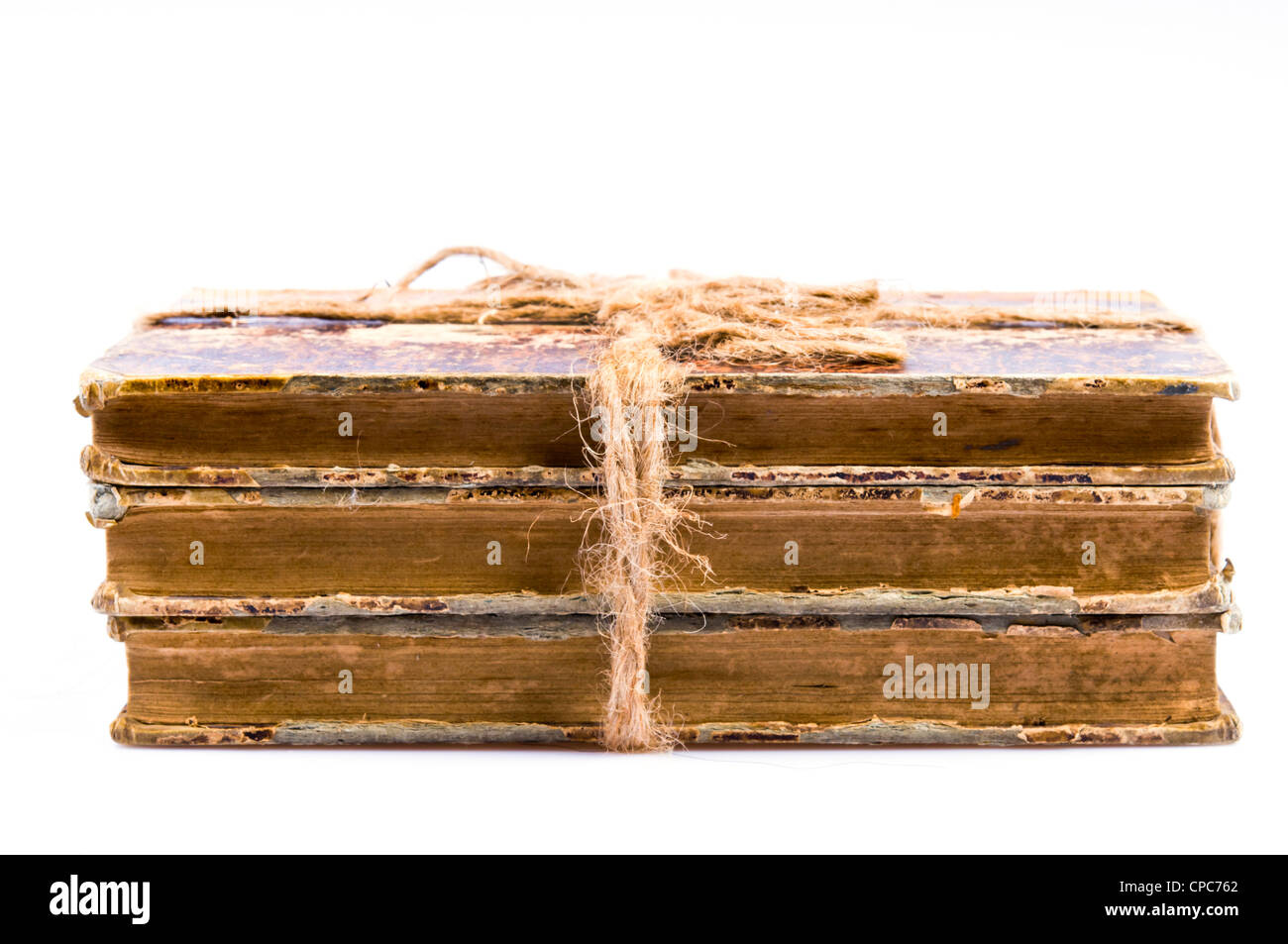 three old books stacked Stock Photo - Alamy
