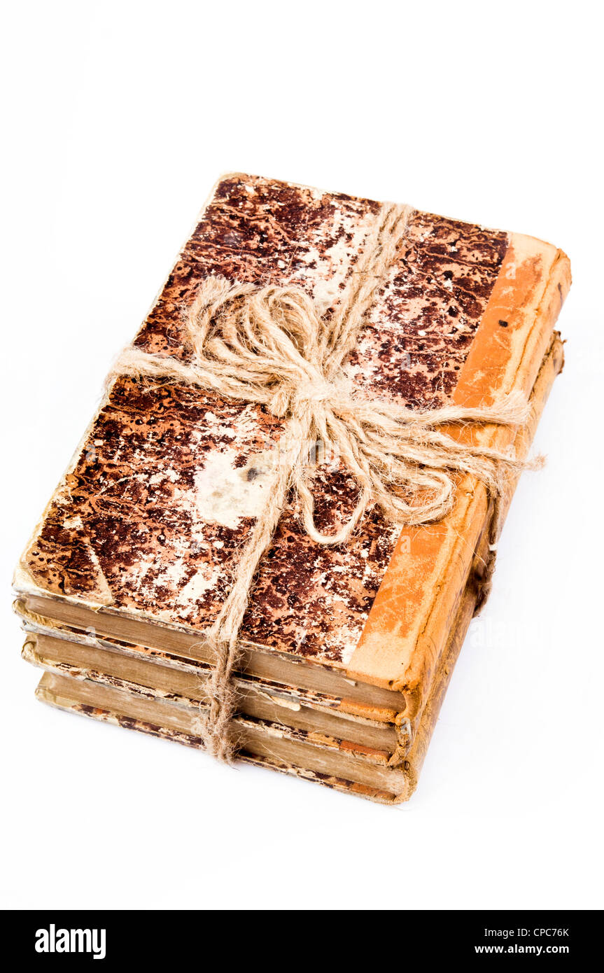 three old books stacked Stock Photo - Alamy