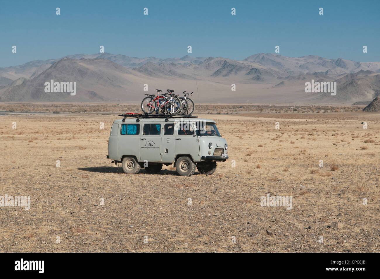 a loaded touring Russian Furgon van in the Altai region of Western ...