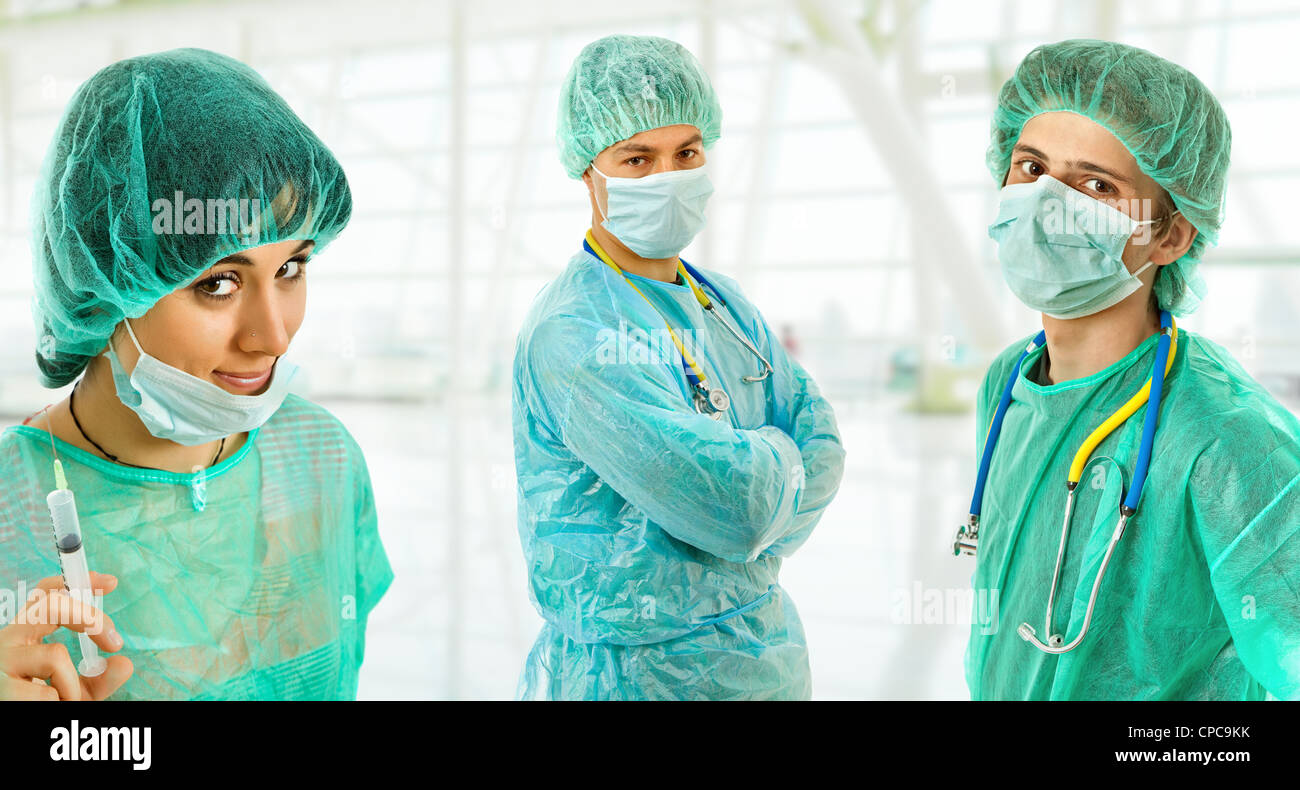 three young doctors, isolated on white background Stock Photo - Alamy