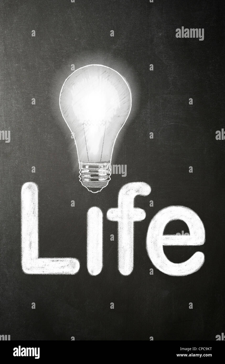 The word Life and a Bulb drawn on a blackboard in white chalk CONCEPT ...