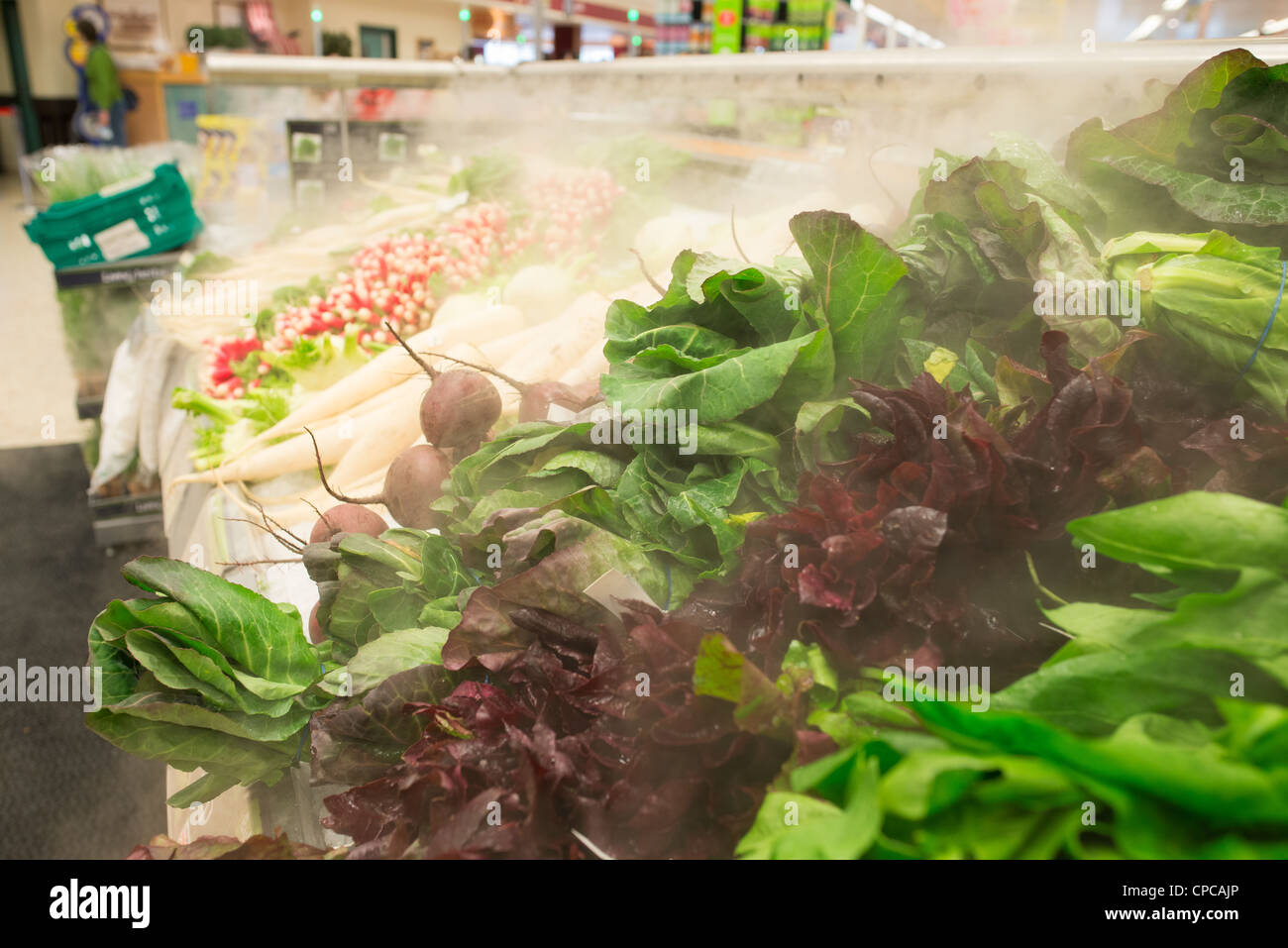 Supermarket fresh vegetable counter. UK Stock Photo - Alamy
