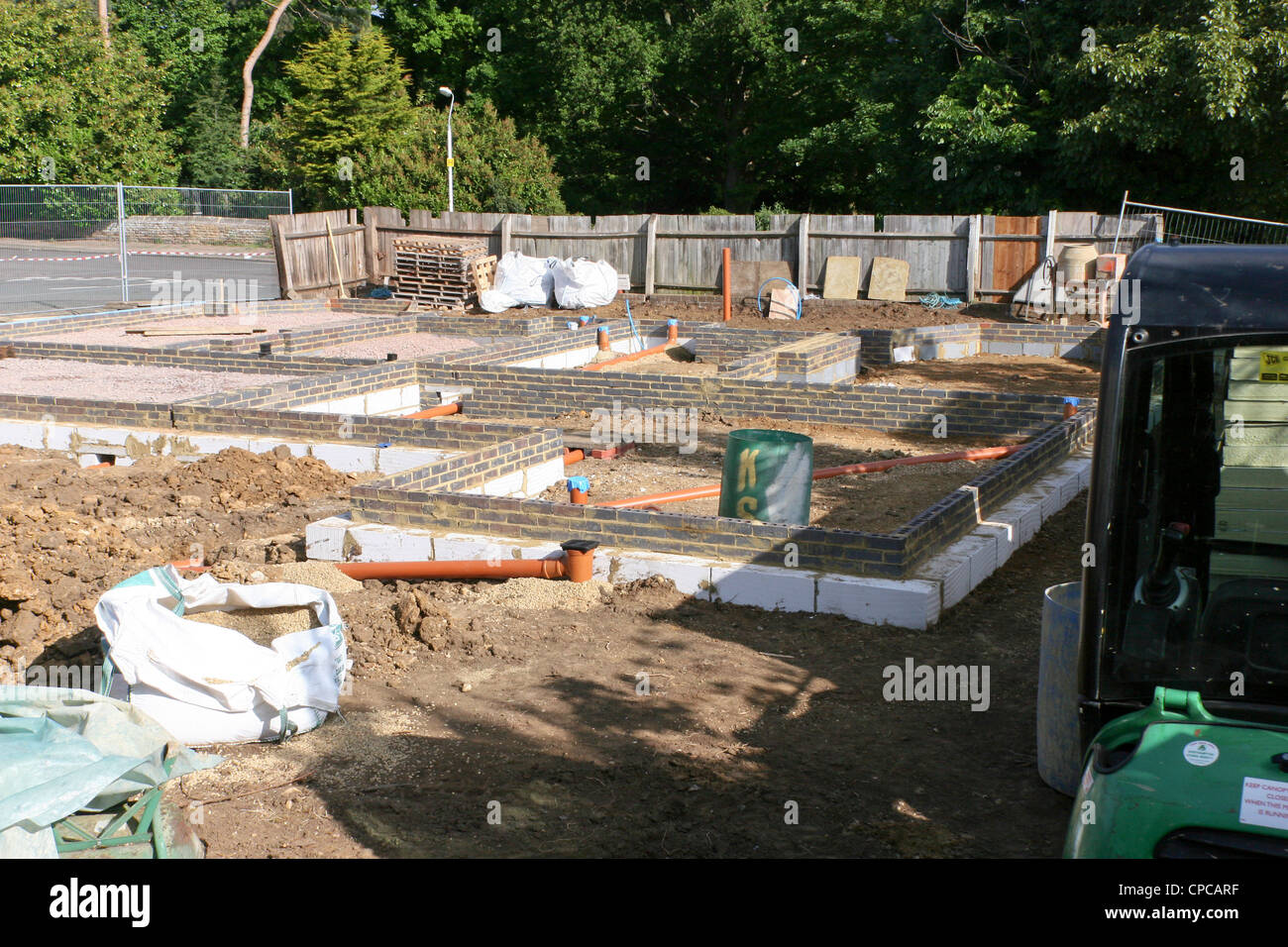 Pair of Semi's under construction by small builder Stock Photo - Alamy