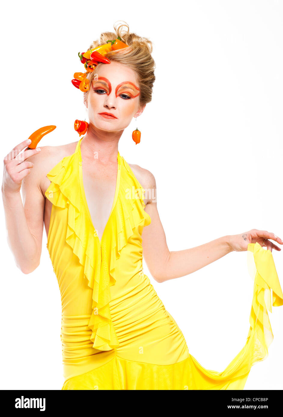 Beautiful Woman with hot and spicy Peppers and creative make-up Stock ...