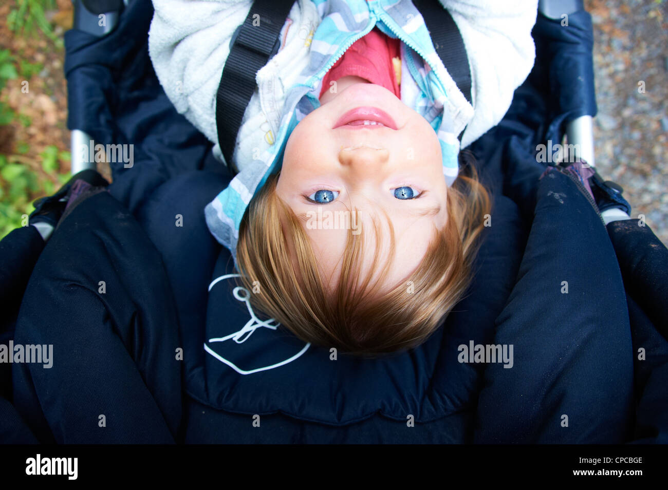 Baby girl in a pram Stock Photo - Alamy