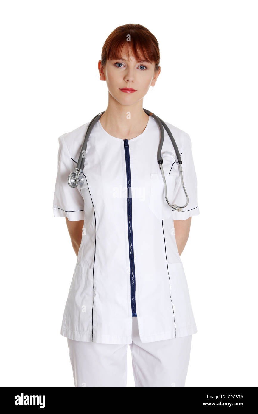 Serious nurse or young female medical doctor isolated on white ...