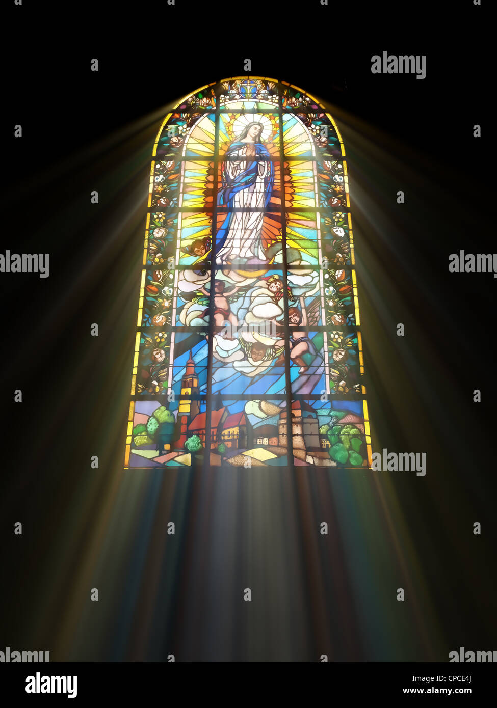 Biblical stained glass with rays of light shining through Stock Photo ...