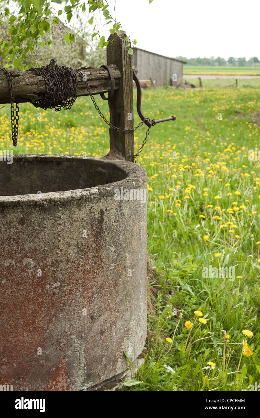 Deteriorating water well Stock Photo - Alamy