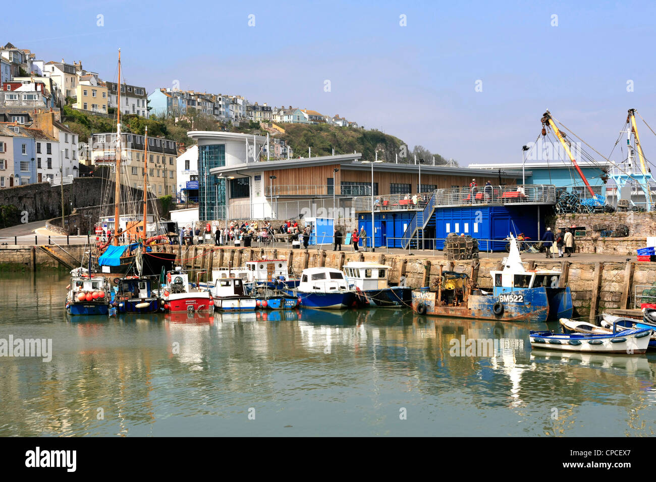 The new Fish Market building behind the boats at Brixham in Devon Stock ...