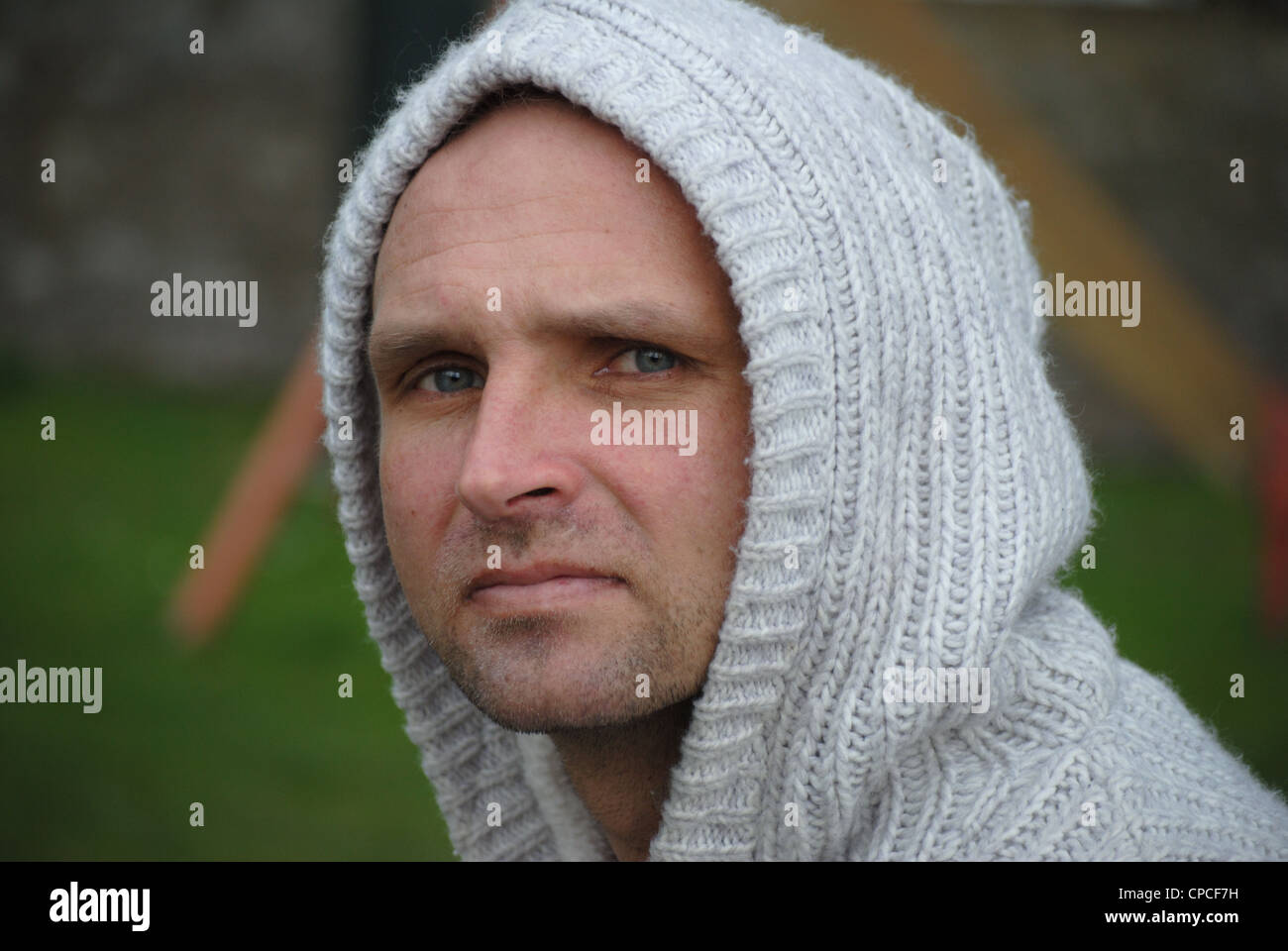 portrait of young man with hood Stock Photo - Alamy