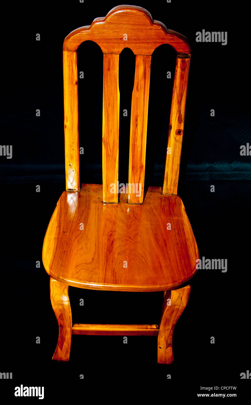wood chair on black background Stock Photo - Alamy