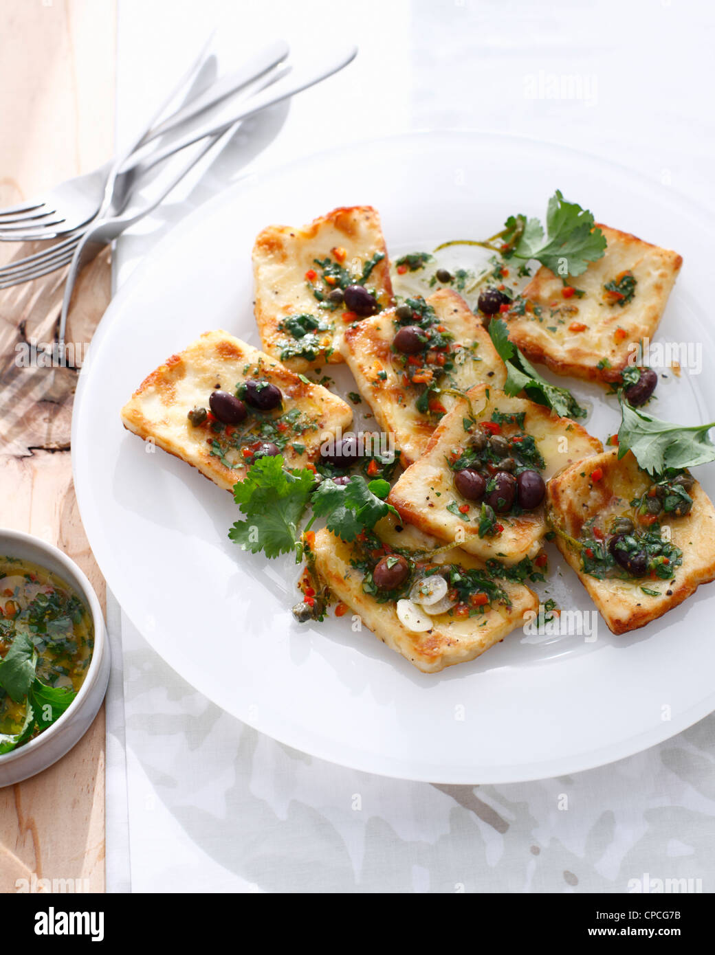 Plate of haloumi chili Stock Photo - Alamy