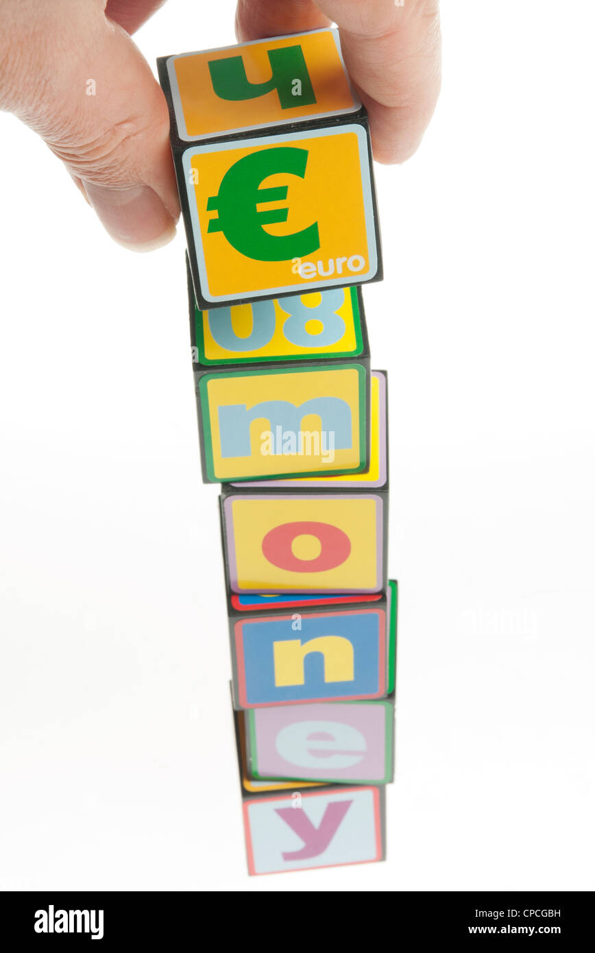 toy building blocks spelling money concept Stock Photo - Alamy