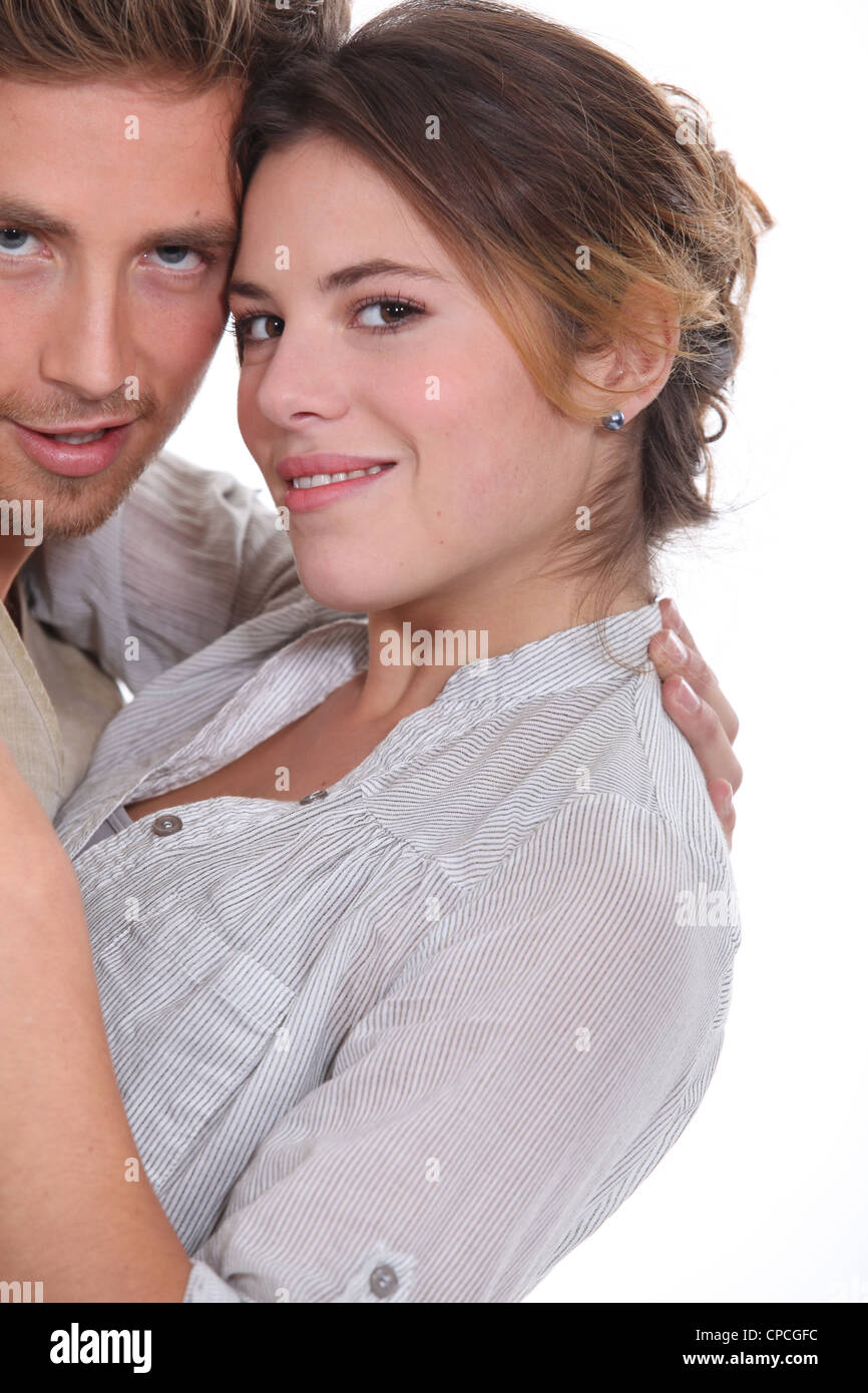 young attractive couple hugging Stock Photo - Alamy