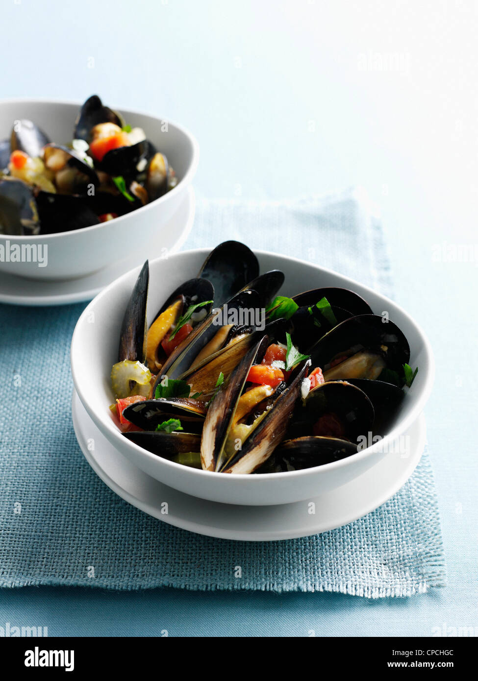 Bowl of clams and vegetables Stock Photo - Alamy