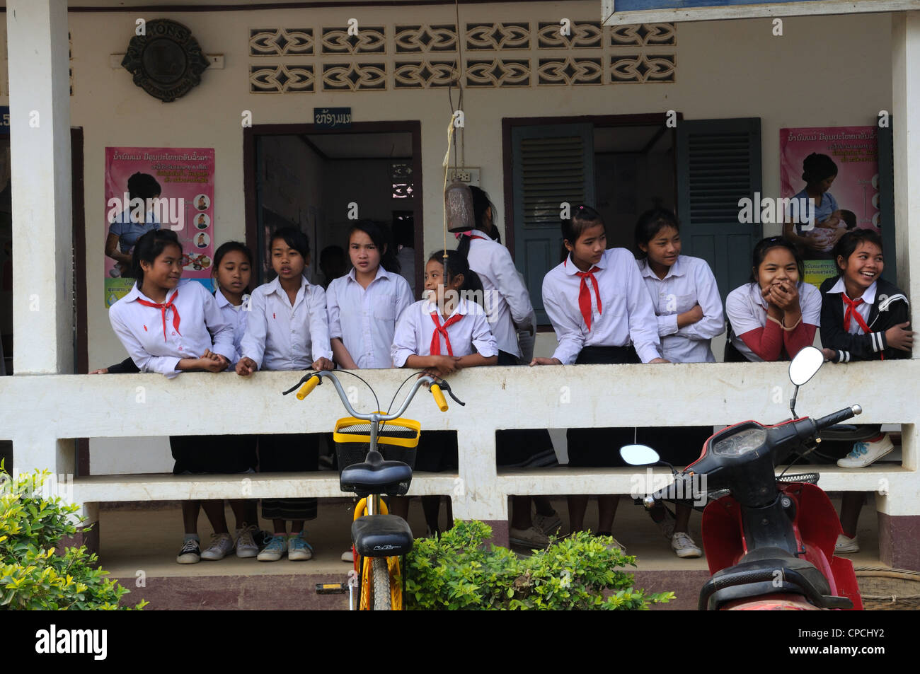 Lao school children during a presentation of books and stationary by ...