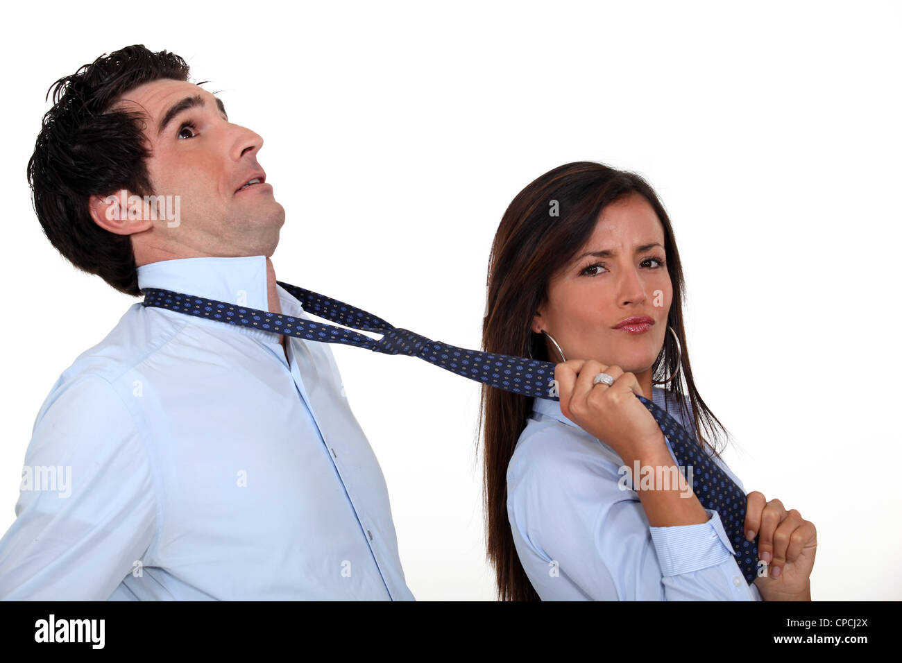 A woman using her boyfriend's tie as a leash Stock Photo - Alamy