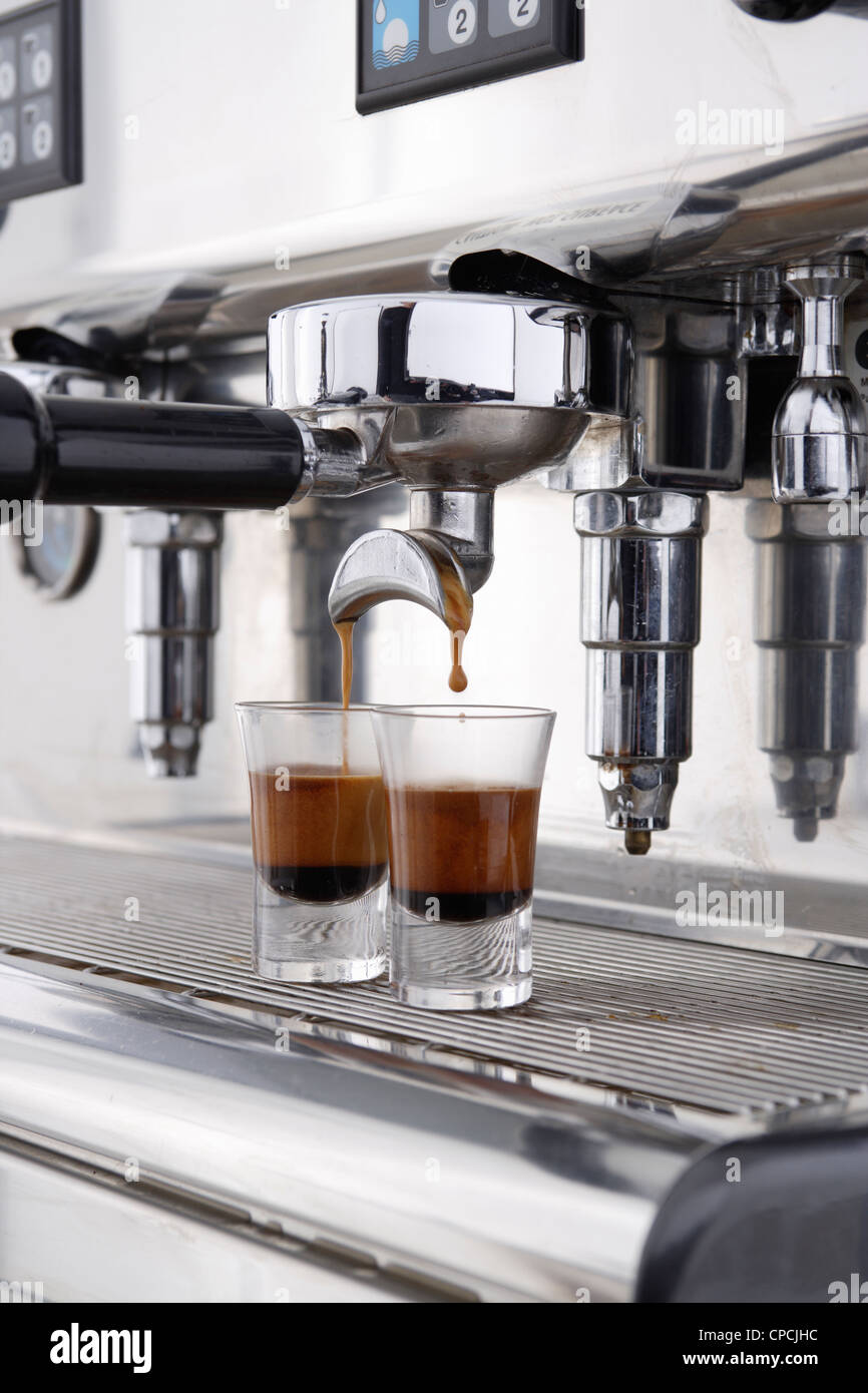 Close up of espresso machine at work Stock Photo - Alamy