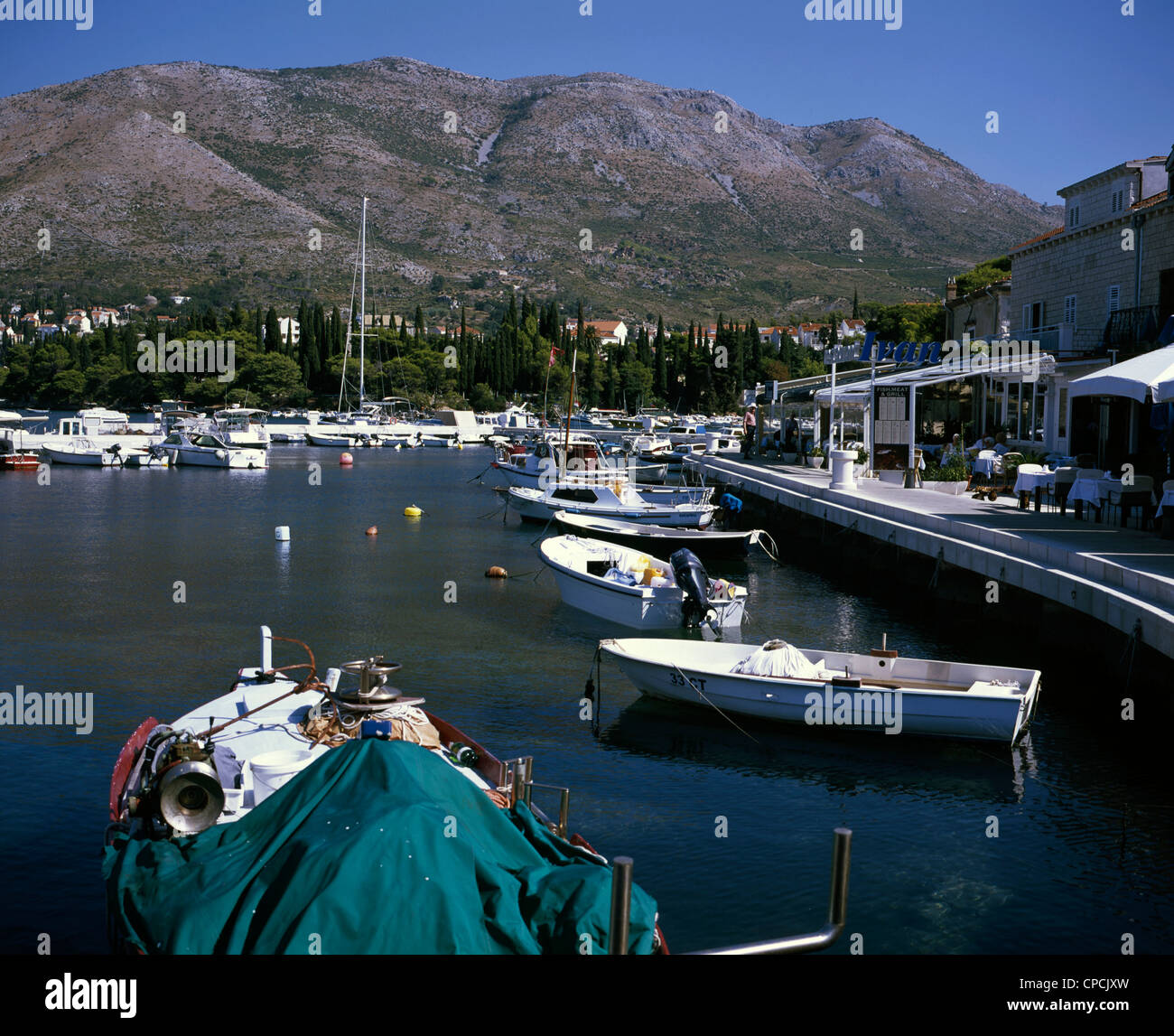 Small fishing and pleasure boats by the seafront at the town of Cavtat ...