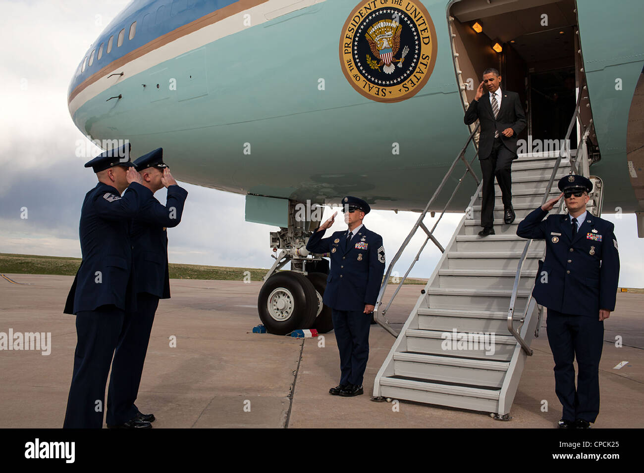 President Barack Obama disembarks Air Force One upon his arrival April ...