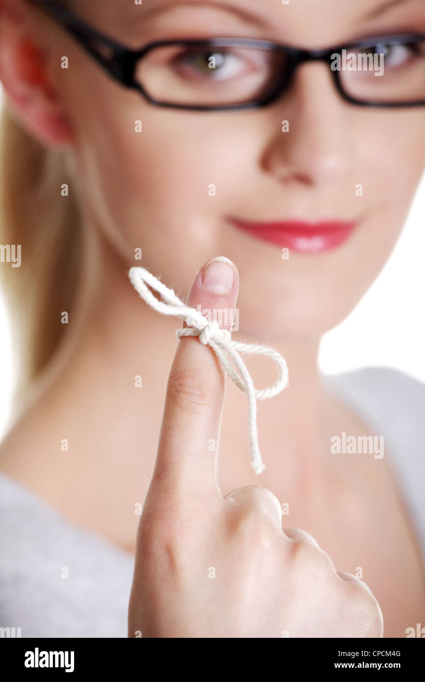 Woman trying to remember what the piece of string round her finger was ...