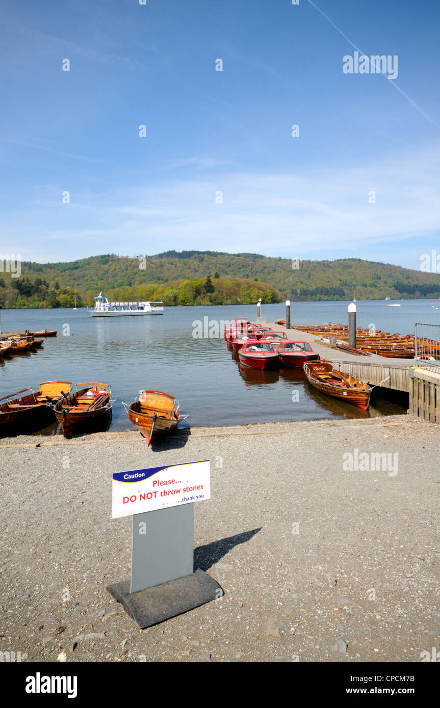 'Please... DO NOT throw stones' sign with view across Lake Windermere ...