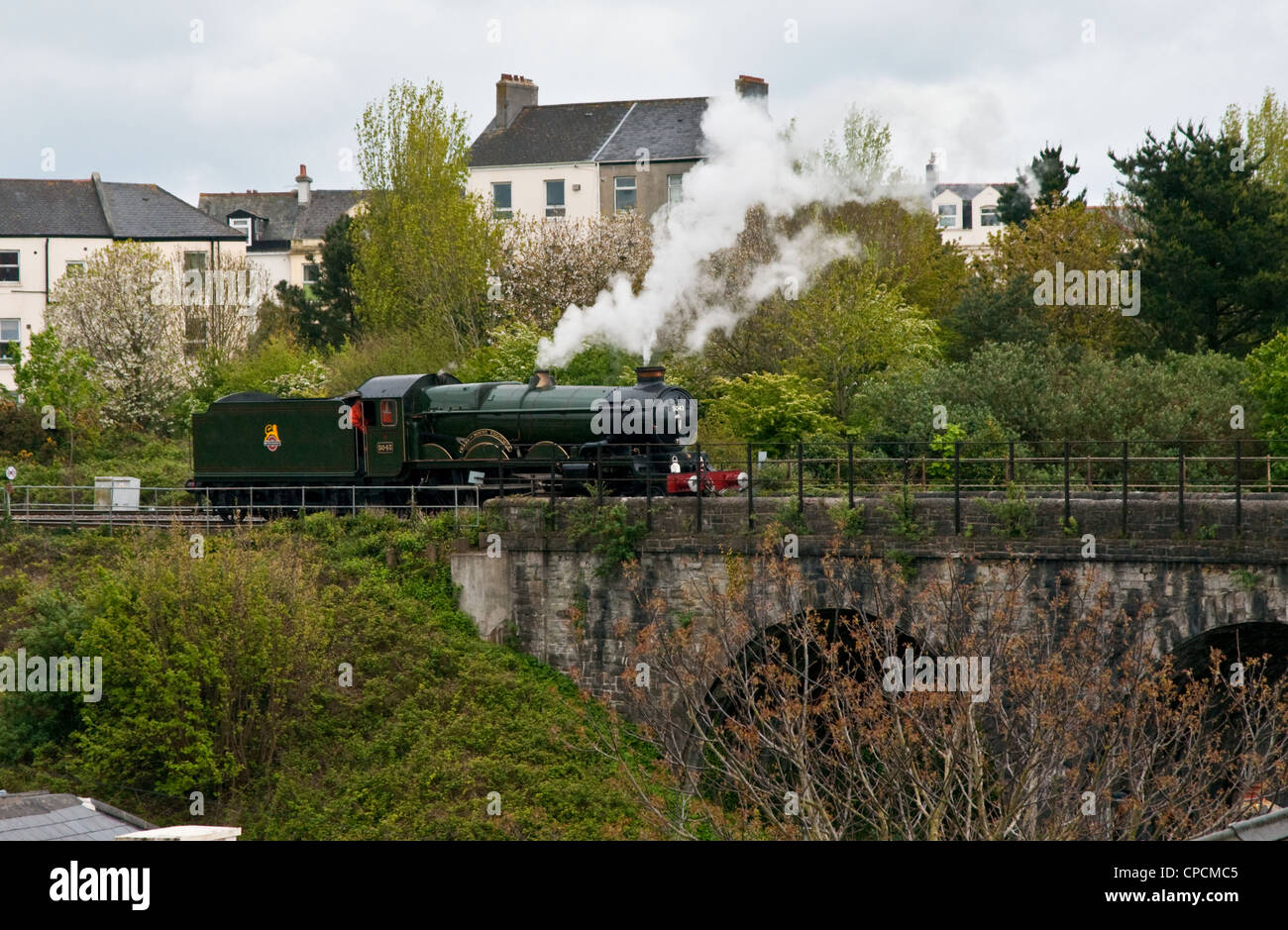 A British Castle class steam train crossing a bridge Stock Photo - Alamy