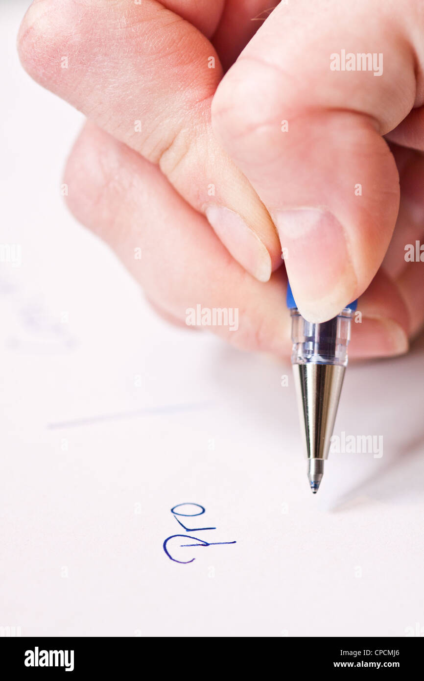 womans hand is writing a letter with a pen Stock Photo - Alamy