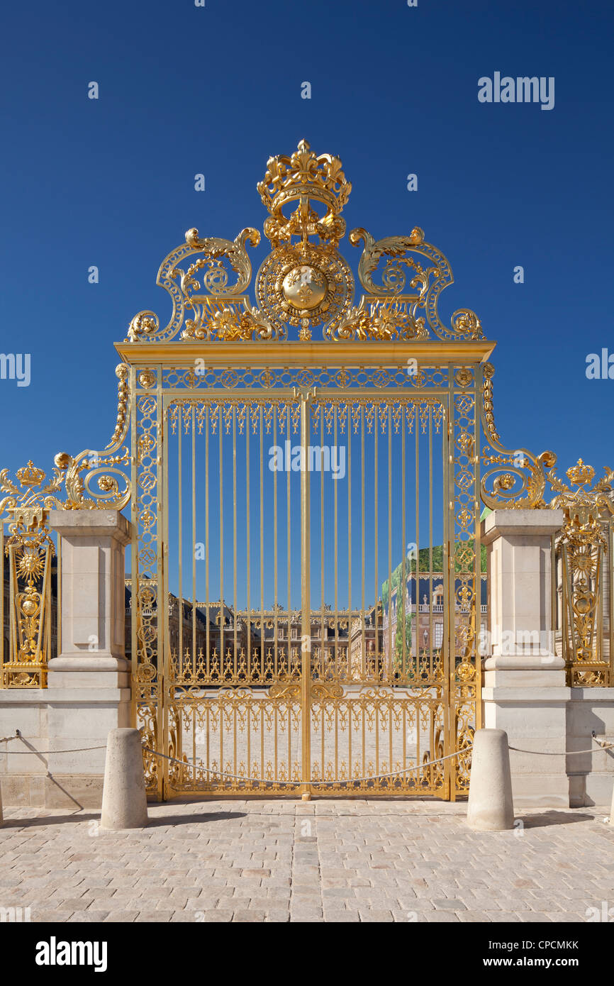 Golden gate of the Palace of Versailles. Versailles, France Stock Photo ...