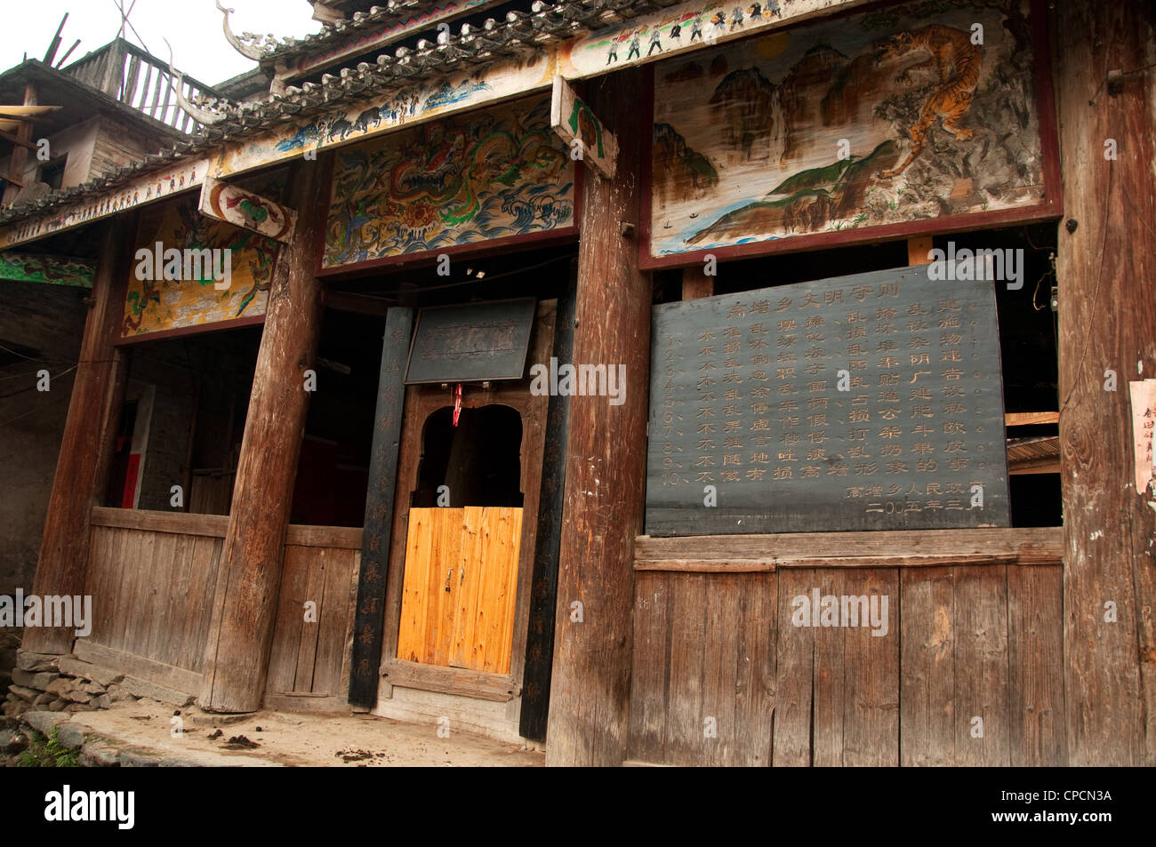 Front of a Dong people traditional house with frescoes, Dong people ...