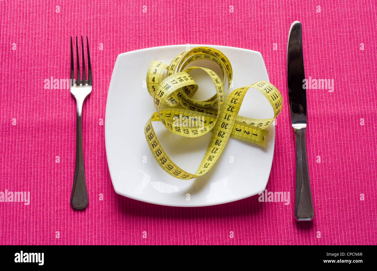 healthy eating concept in a pink background Stock Photo - Alamy