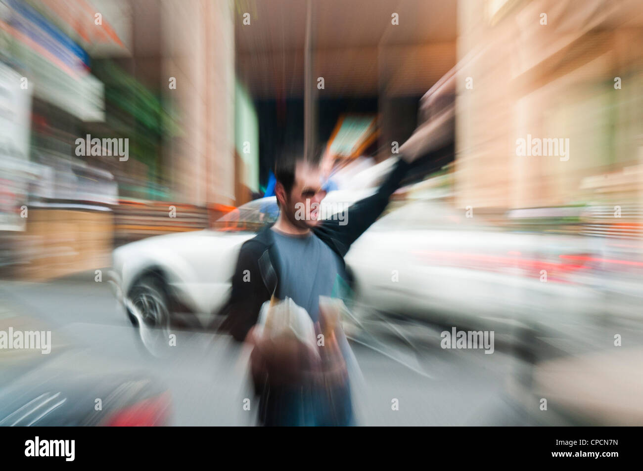 man hailing NYC taxi Stock Photo - Alamy
