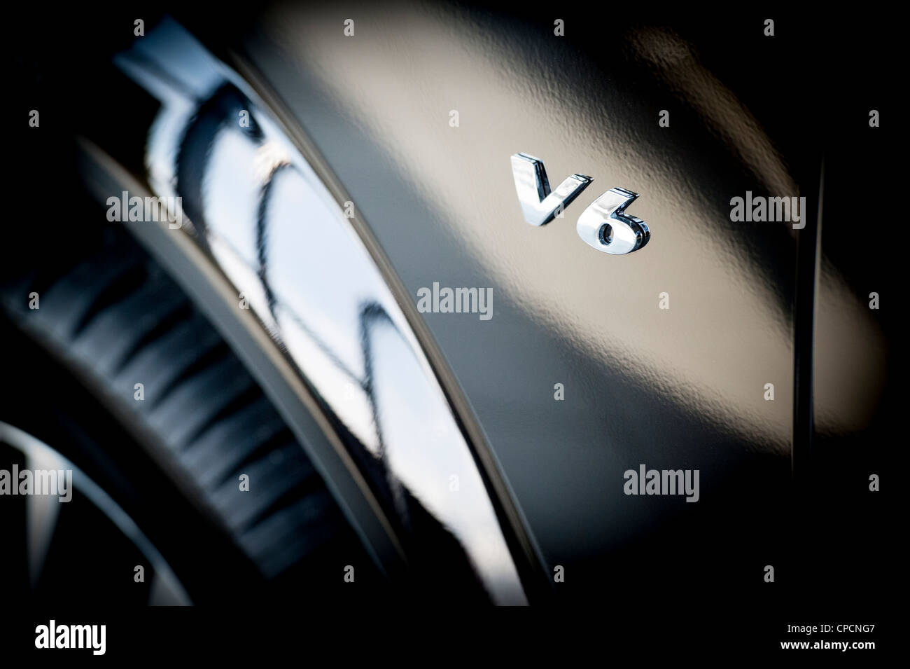V6 Emblem on side of new car Stock Photo - Alamy