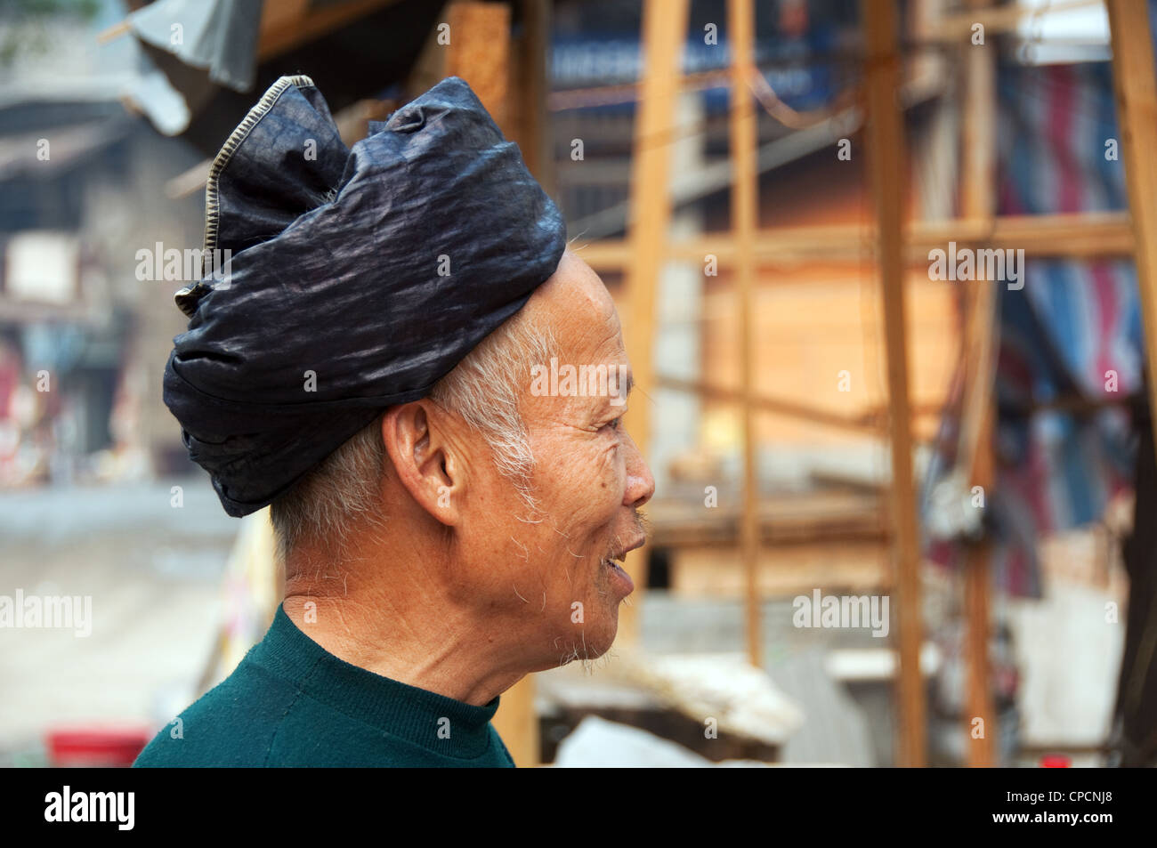 An old man with black indigo turban, Dong people village, Southern ...