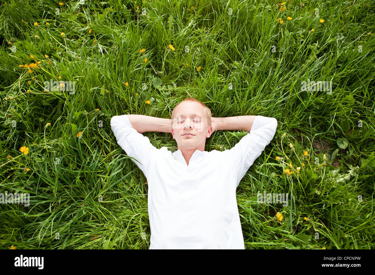 young man outdoor in summer in nature happy Stock Photo - Alamy