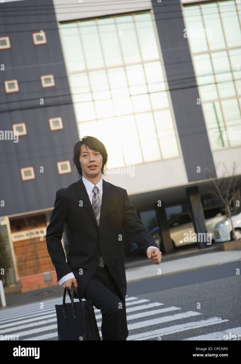 Running with bag outdoor hi-res stock photography and images - Alamy