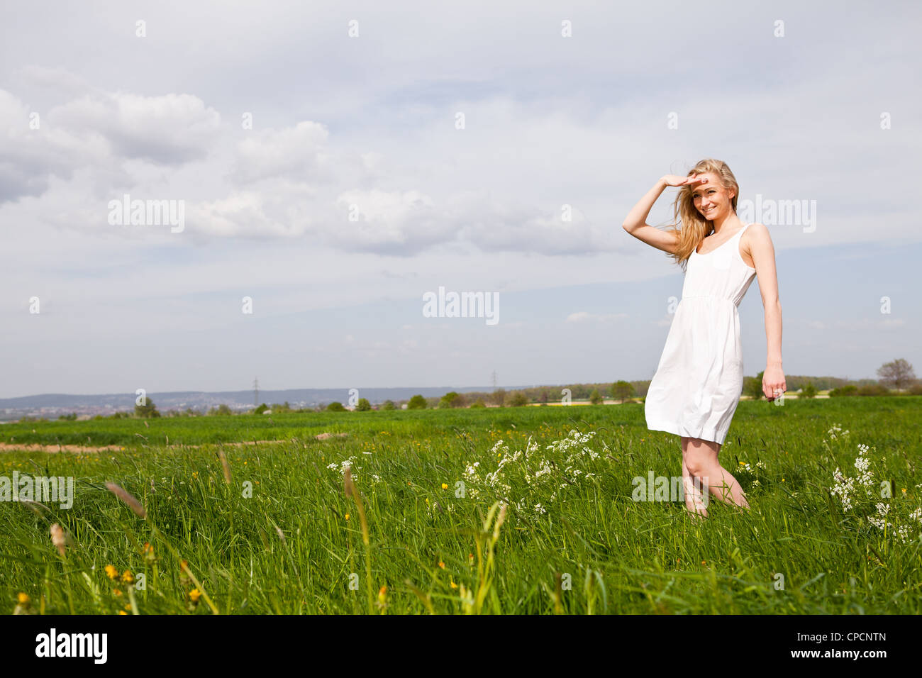 beautiful blonde woman outdoor in summer happy Stock Photo - Alamy